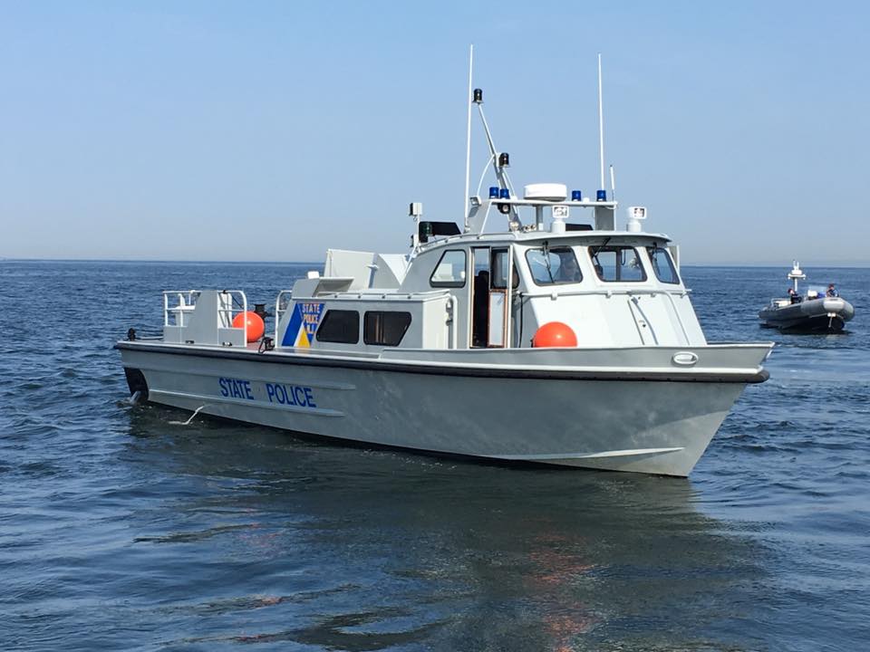 State trooper rescues 3 from sinking boat about 100 yards off Atlantic ...