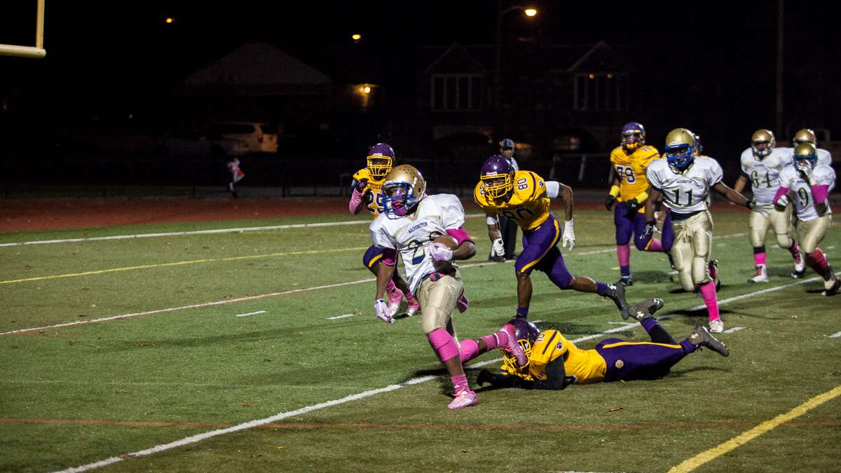 MLK Cougars secure playoff berth with 28-14 win over Washington - WHYY