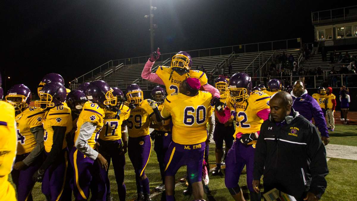 MLK Cougars secure playoff berth with 28-14 win over Washington - WHYY