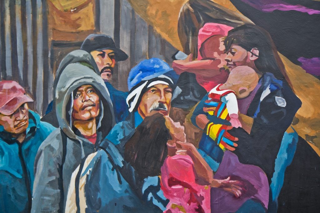 Immigration mural in North Philly pops with Latinx pride - WHYY