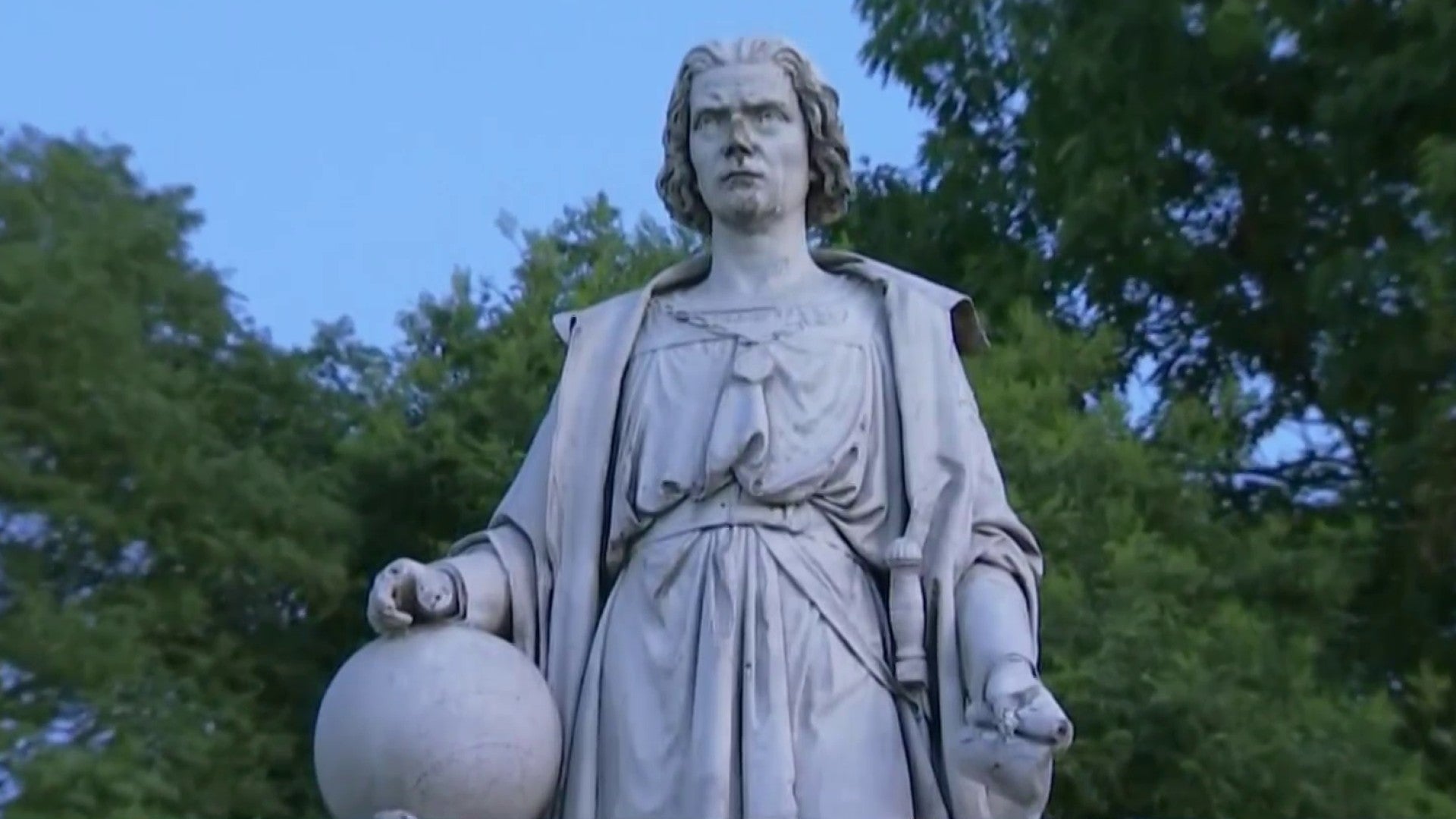 Men, some armed with guns or bats, surround South Philly Columbus statue - WHYY