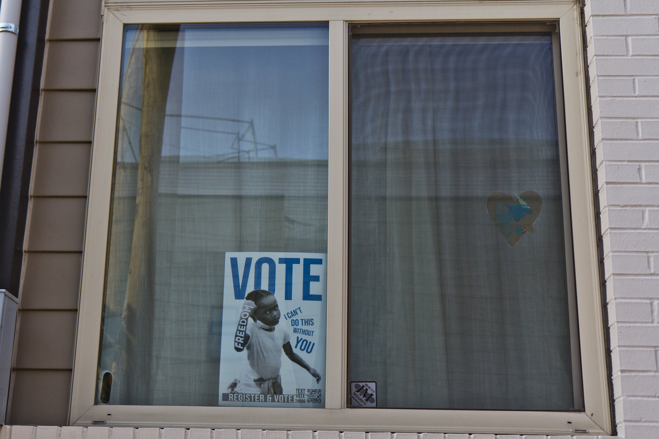 Philadelphians window displays help get out the vote - WHYY