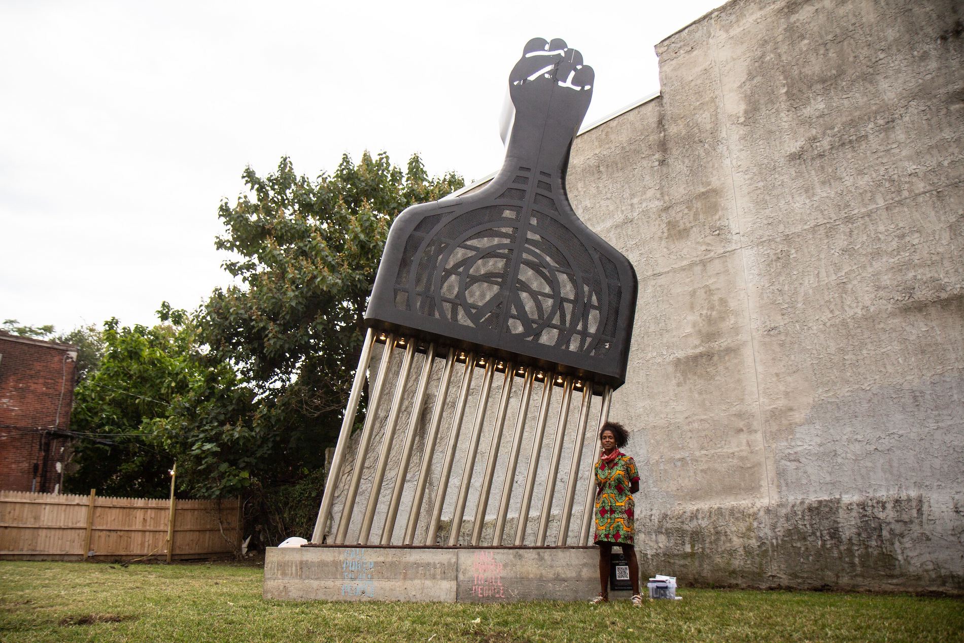 A 28-foot Afro pick takes over 52nd St. lot in West Philly - WHYY