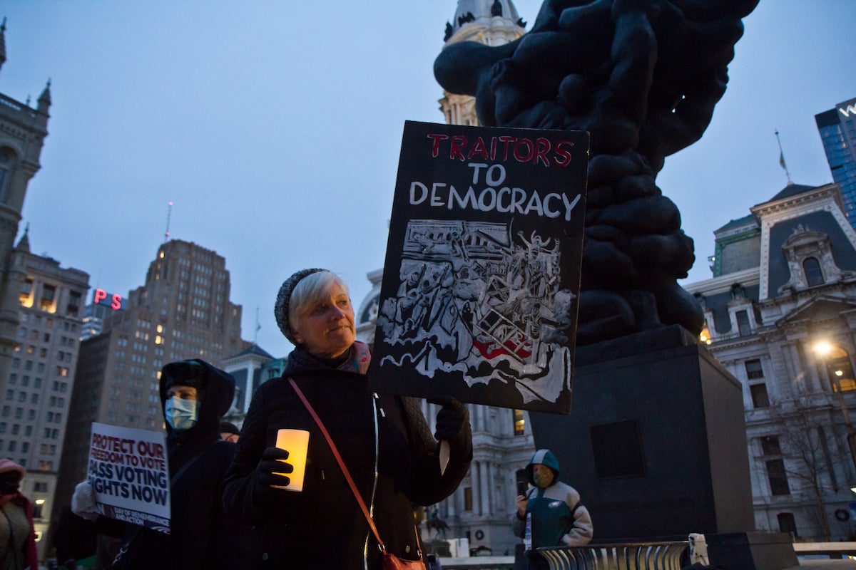 Philly holds vigil to remember horror of insurrection - WHYY