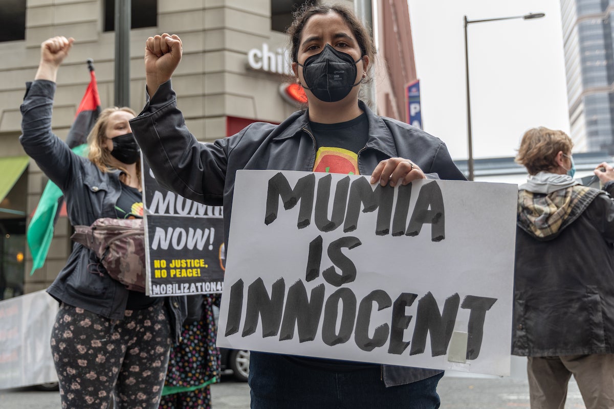 Mumia Abu-Jamal supporters gather outside hearing - WHYY